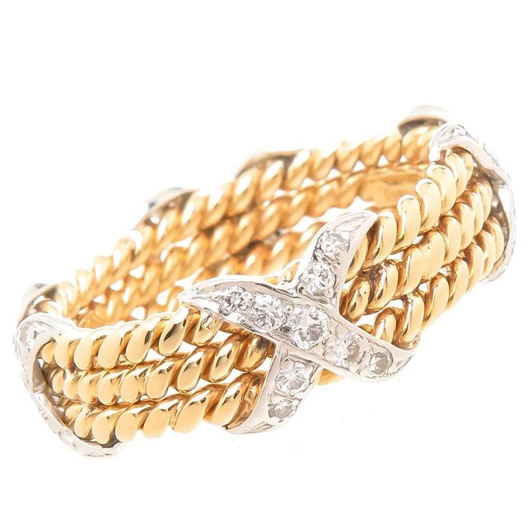 Tiffany and Co. Jean Schlumberger Diamond Gold X Band Ring at 1stDibs