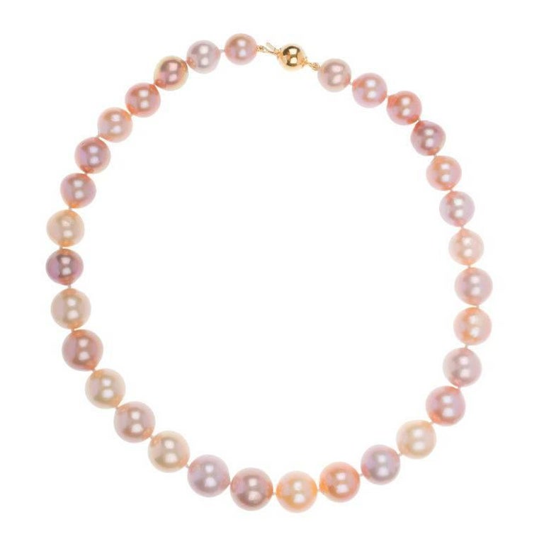 Natural Pink Edison Pearl Strand with 9 Carat Gold Clasp For Sale at ...