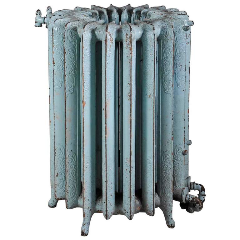 Very unusual cast iron radiator in a round shape. at 1stDibs