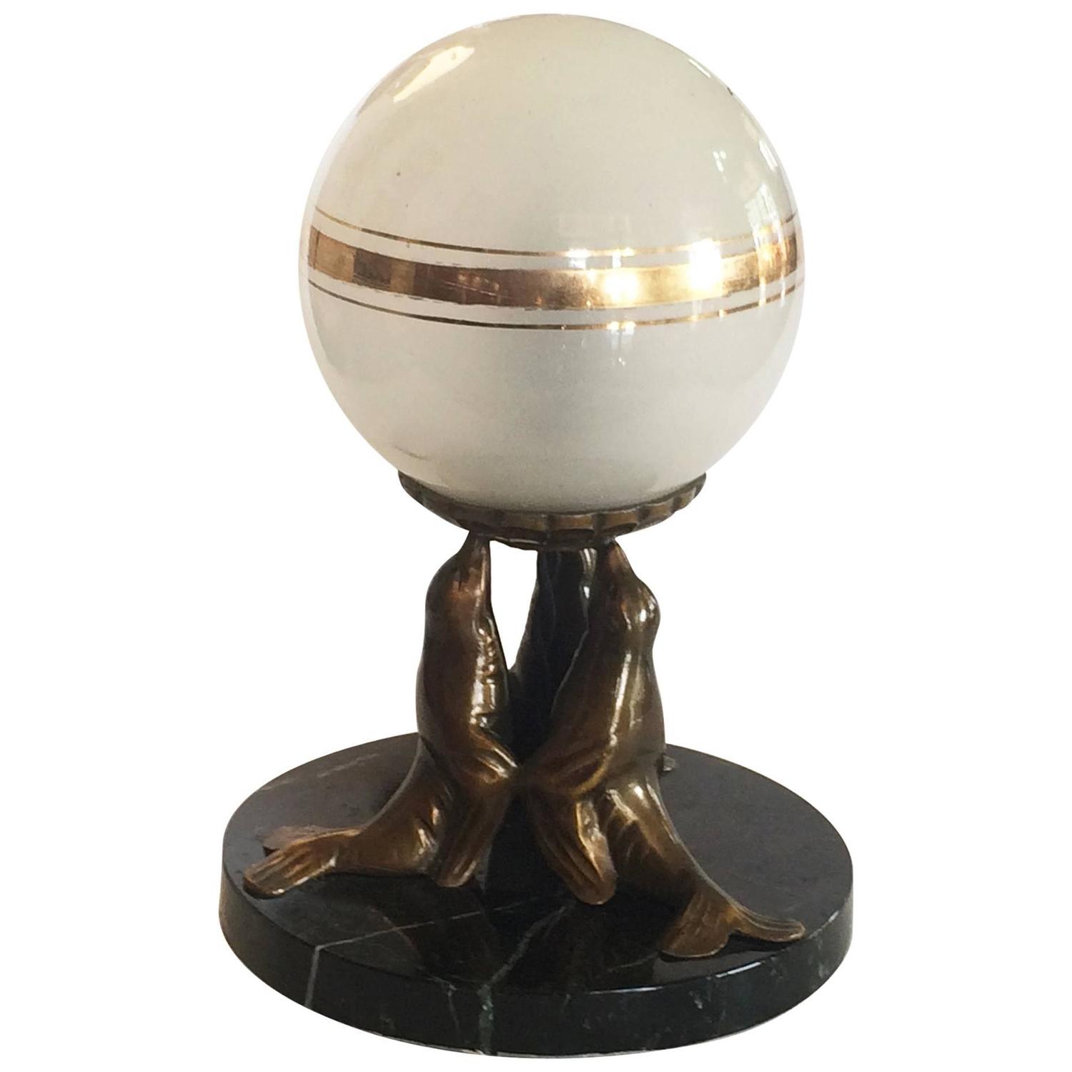 Art Deco Bronze Seal Lamp with Saturn Shade Probably by Louis Carvin at ...