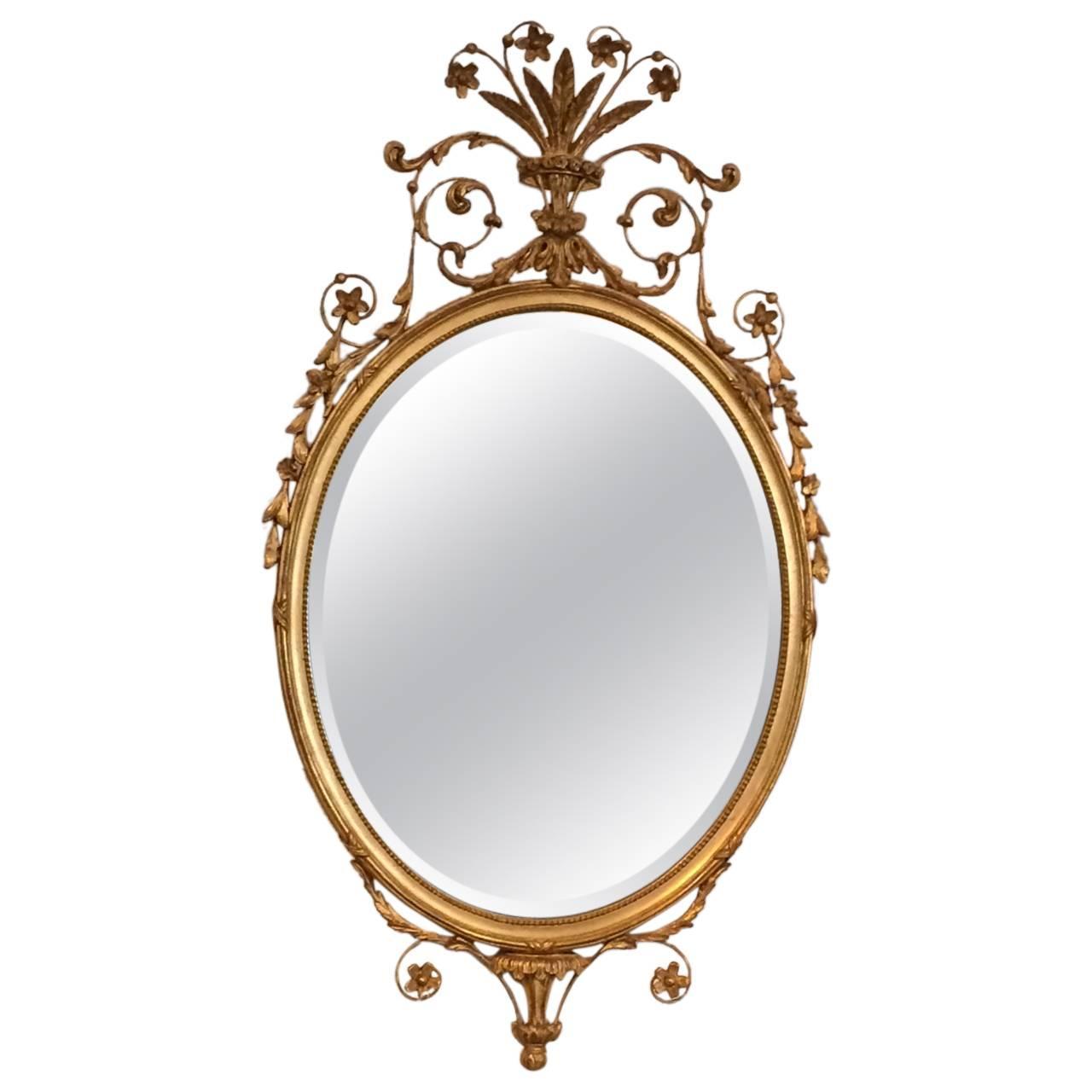 Fancy French Louis XVI Style Oval Gilded Mirror at 1stdibs