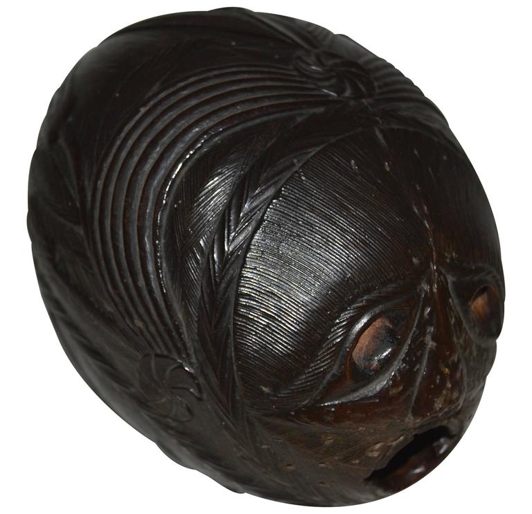 Mexican Carved Coconut Bank For Sale at 1stDibs