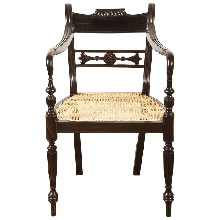 British Colonial Ebony Armchair at 1stDibs