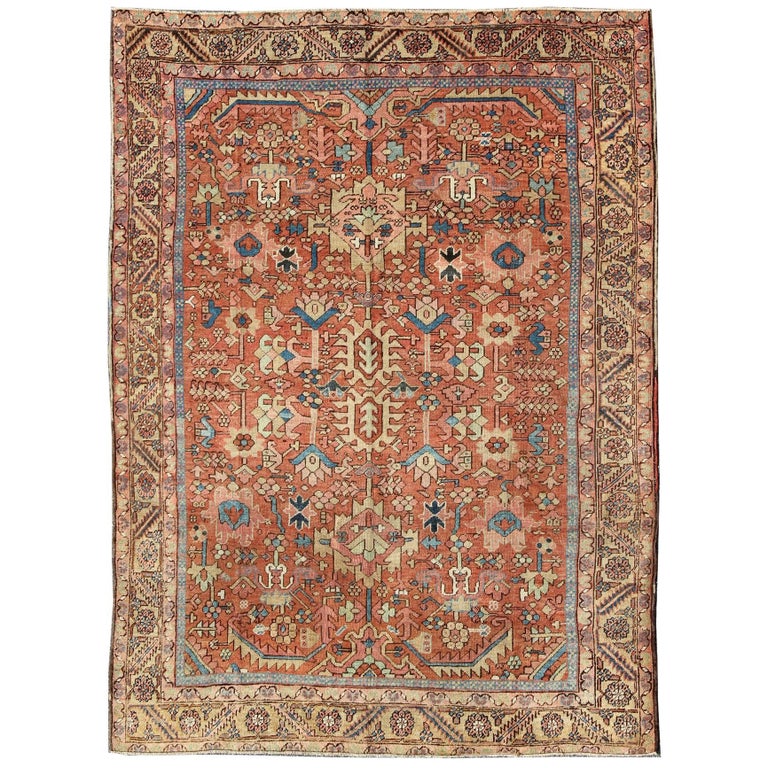 Antique All-Over Persian Heriz Rug in Faded Rust and Gold Colors at 1stDibs