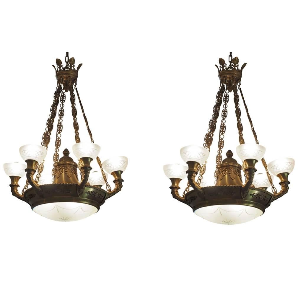 Pair of Massive and Elaborate Theatrical Bronze Chandeliers at 1stDibs