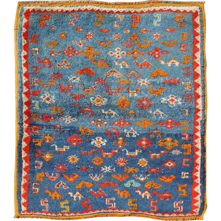 Vintage Moroccan Rug with Beautiful Blue Background at 1stDibs