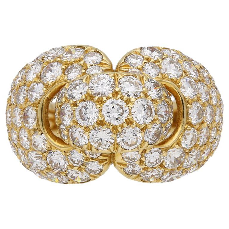 Boucheron Tapered Baguette And Emerald Cut Diamond Yellow Gold