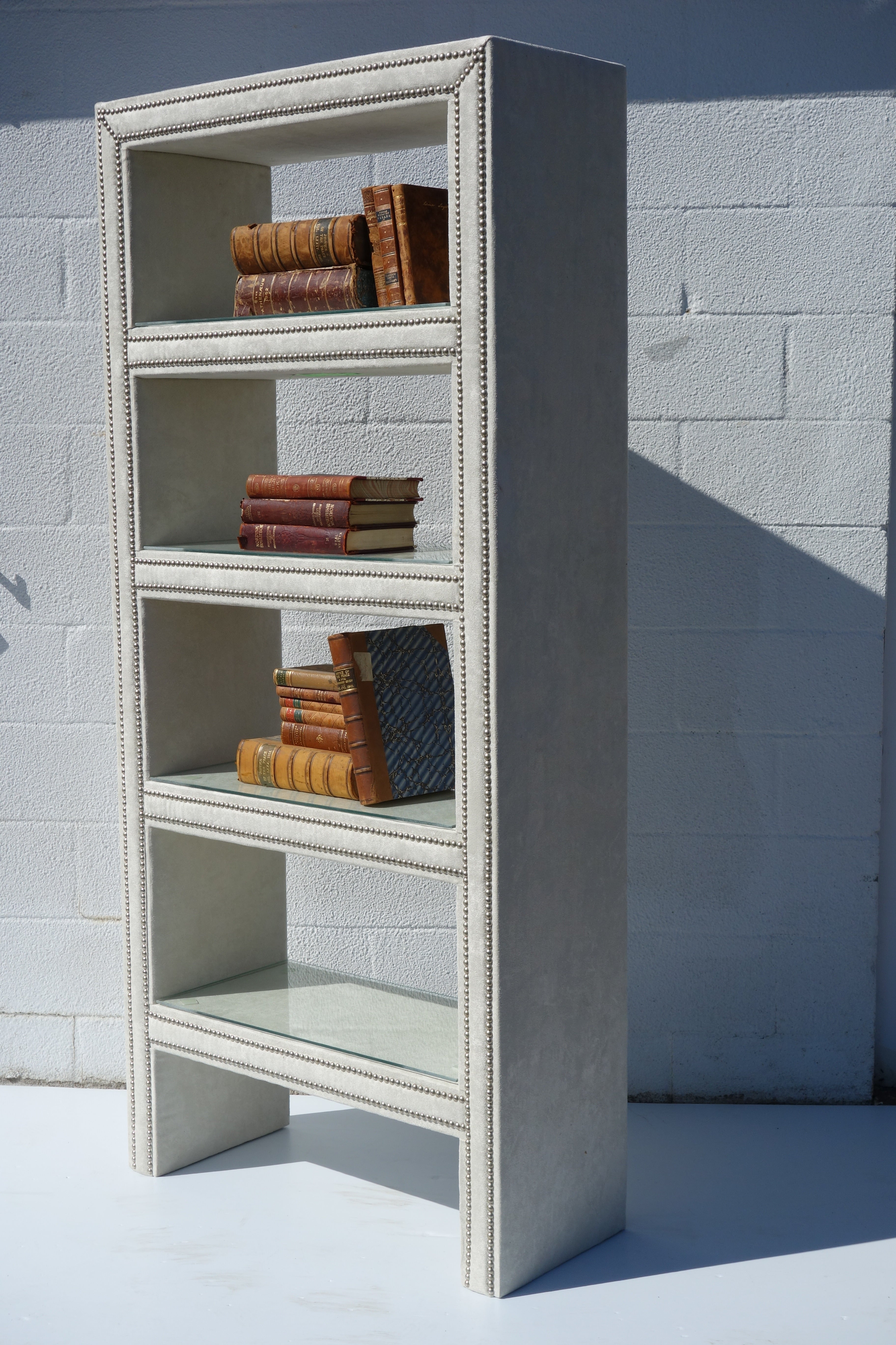 Upholstered Bookcase For Sale at 1stDibs