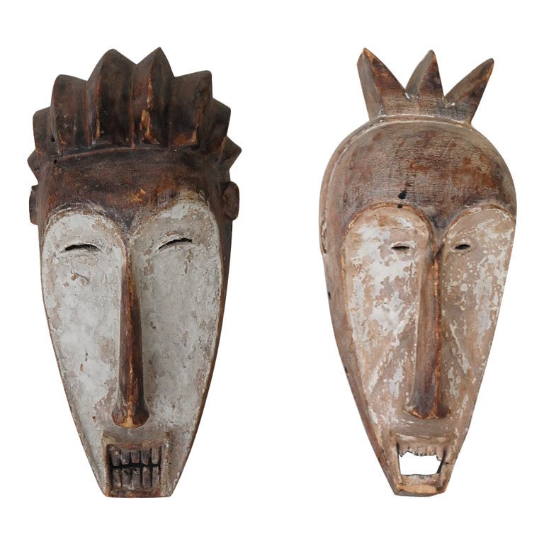 Pair of Decorative Weathered Ngil Style Gabonese African Masks at 1stDibs