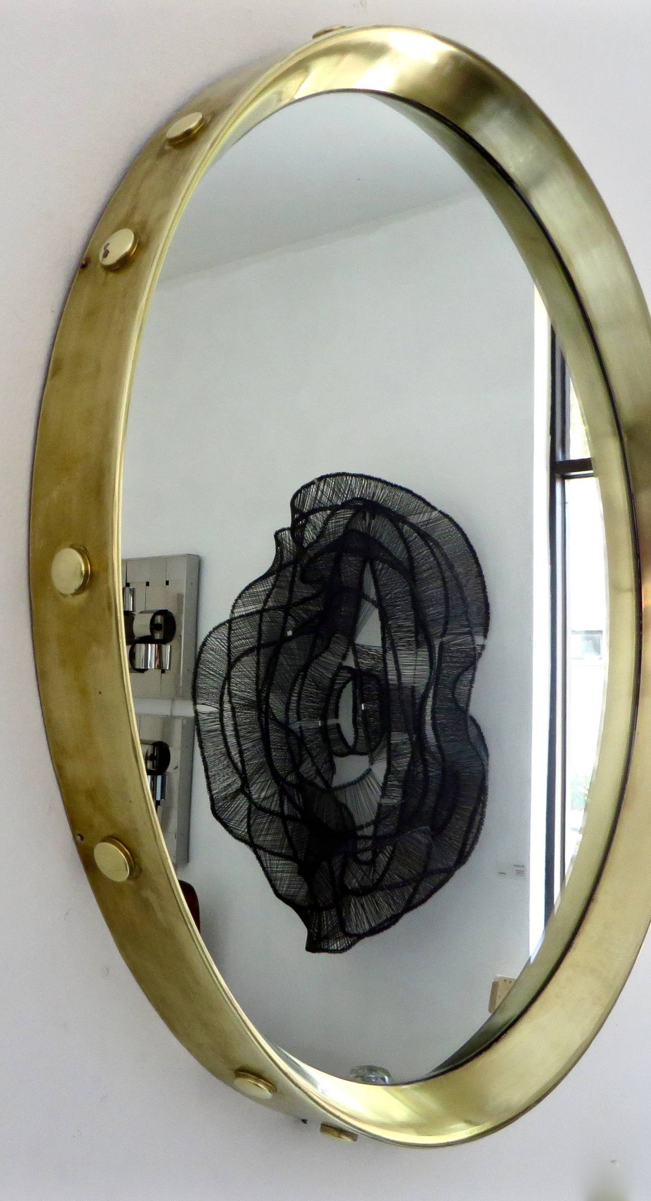Italian Round Brass Framed Mirror with Decorative Buttons at 1stDibs
