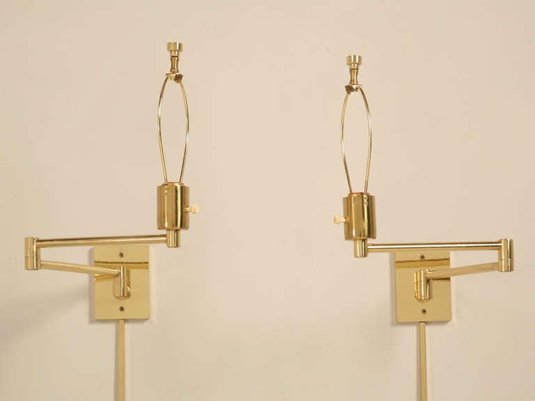 Pair Solid Brass Swing Arm Sconces by Hansen New York at 1stDibs