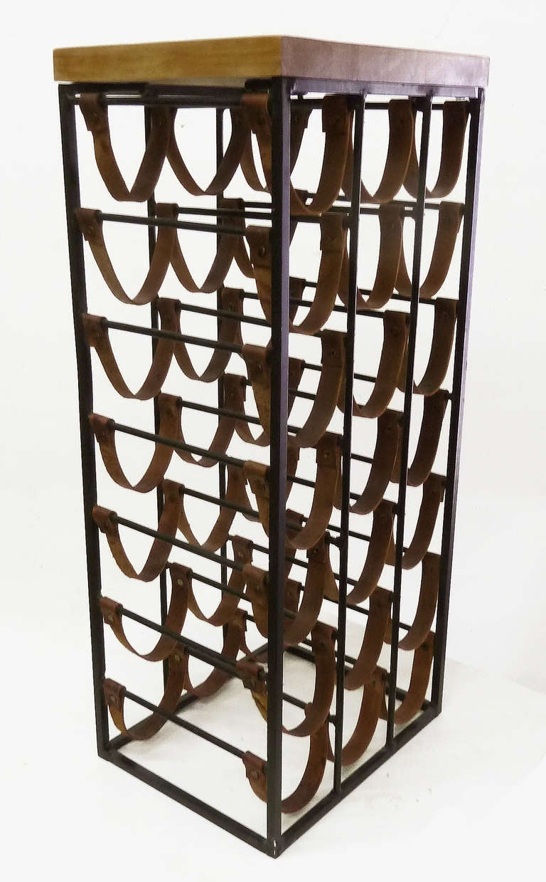 Mid-Century Modern Iron and Leather Wine Rack by Arthur Umanoff at 1stDibs