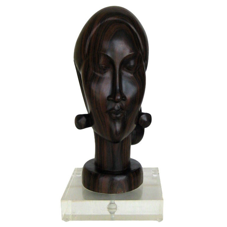 Ebony Woman Head Sculpture on a Lucite Base at 1stDibs