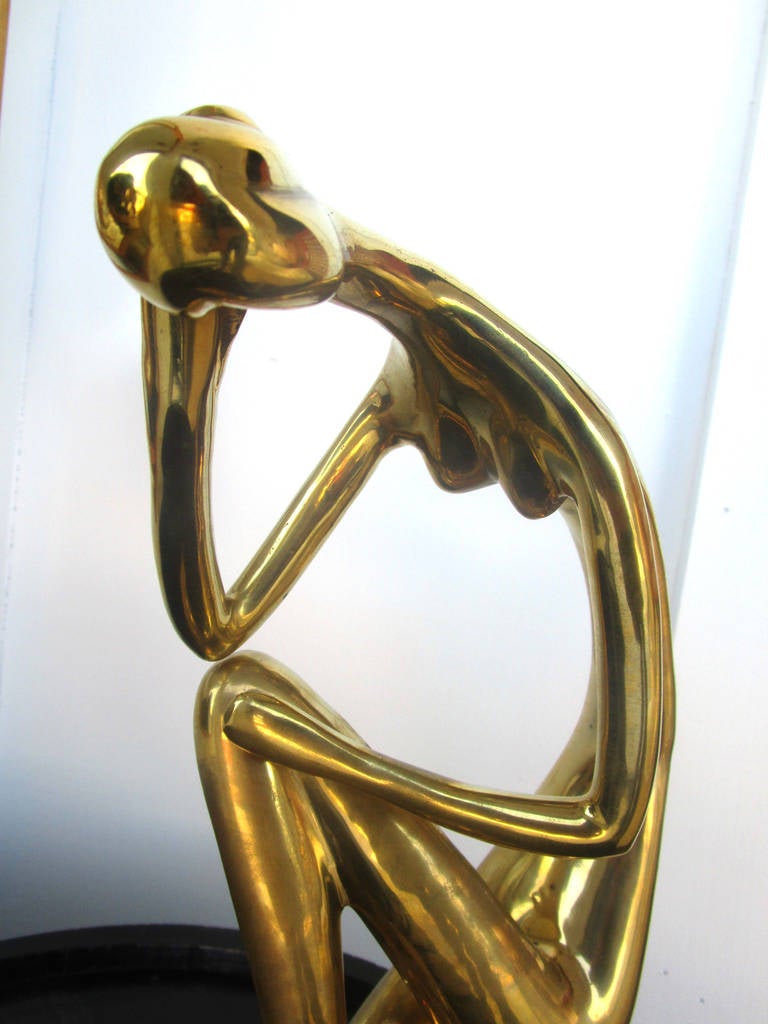 Stylized Brass Sculpture of a Woman at 1stDibs