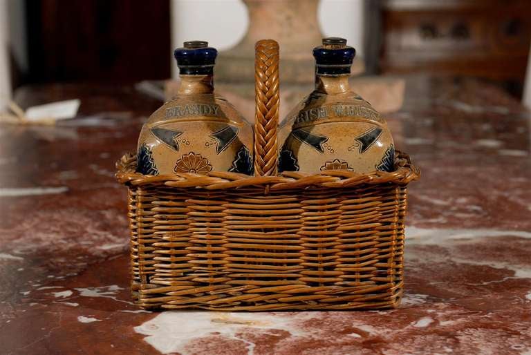 Two Victorian English Pottery Decanters in Tantalus-Inspired Wicker ...
