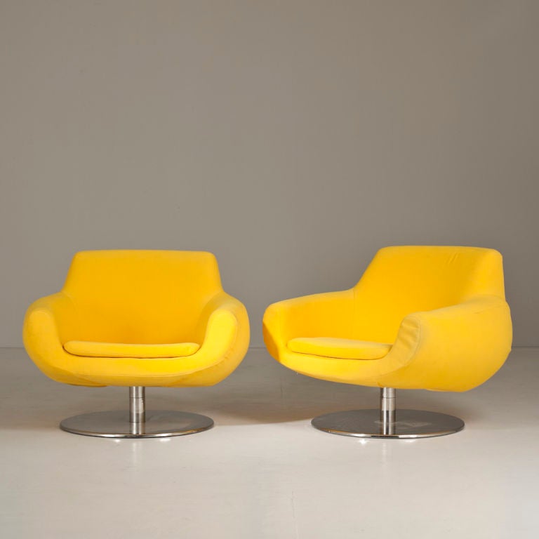 A Pair of Yellow Swivel Chairs on Circular Nickel Bases at 1stDibs