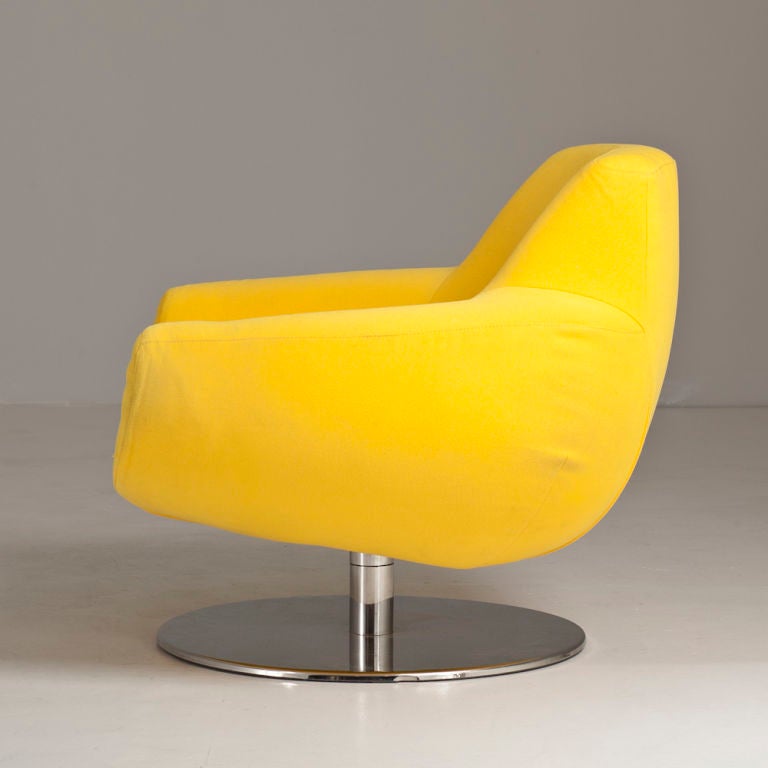 A Pair of Yellow Swivel Chairs on Circular Nickel Bases at 1stDibs