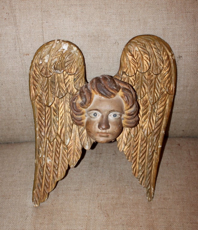Carved Italian Gilt Wood and Painted Winged Cherub Face at 1stDibs