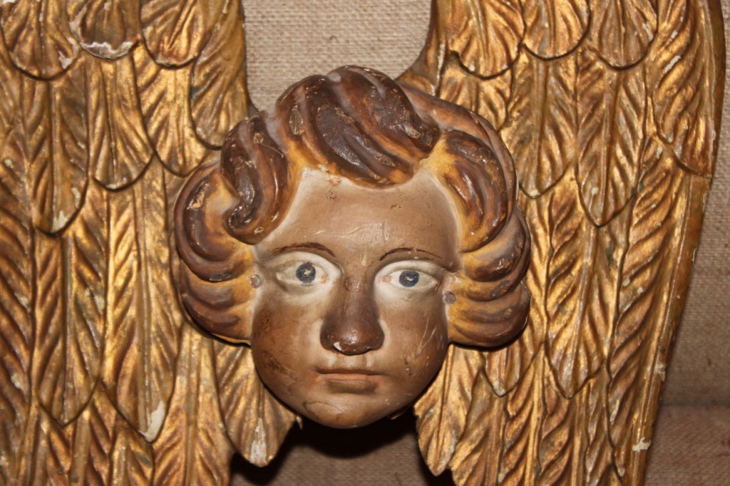 Carved Italian Gilt Wood and Painted Winged Cherub Face at 1stDibs