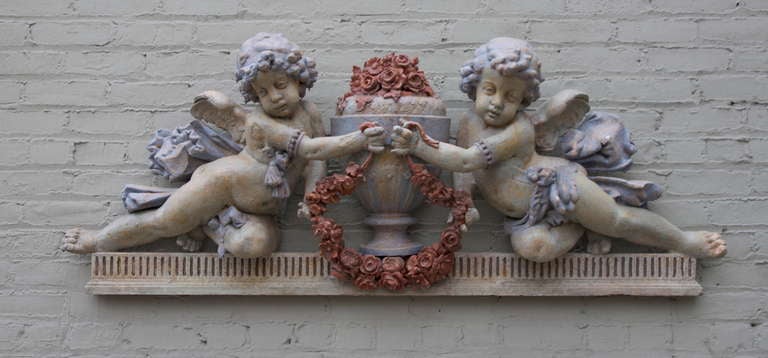 Pair of Italian Painted Cherubs with Wreath at 1stDibs