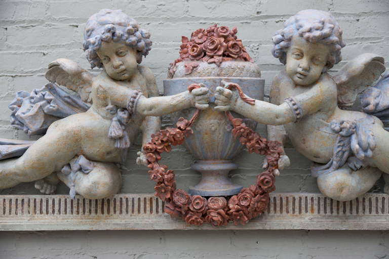 Pair of Italian Painted Cherubs with Wreath at 1stDibs