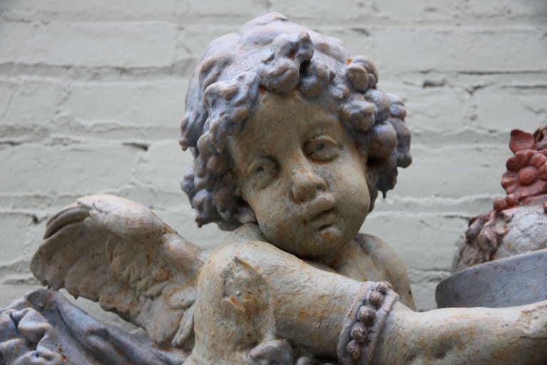 Pair of Italian Painted Cherubs with Wreath at 1stDibs