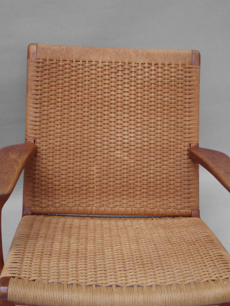 Pair of Teak with Danish Cord Lounge Chairs by Hans Wegner at 1stDibs