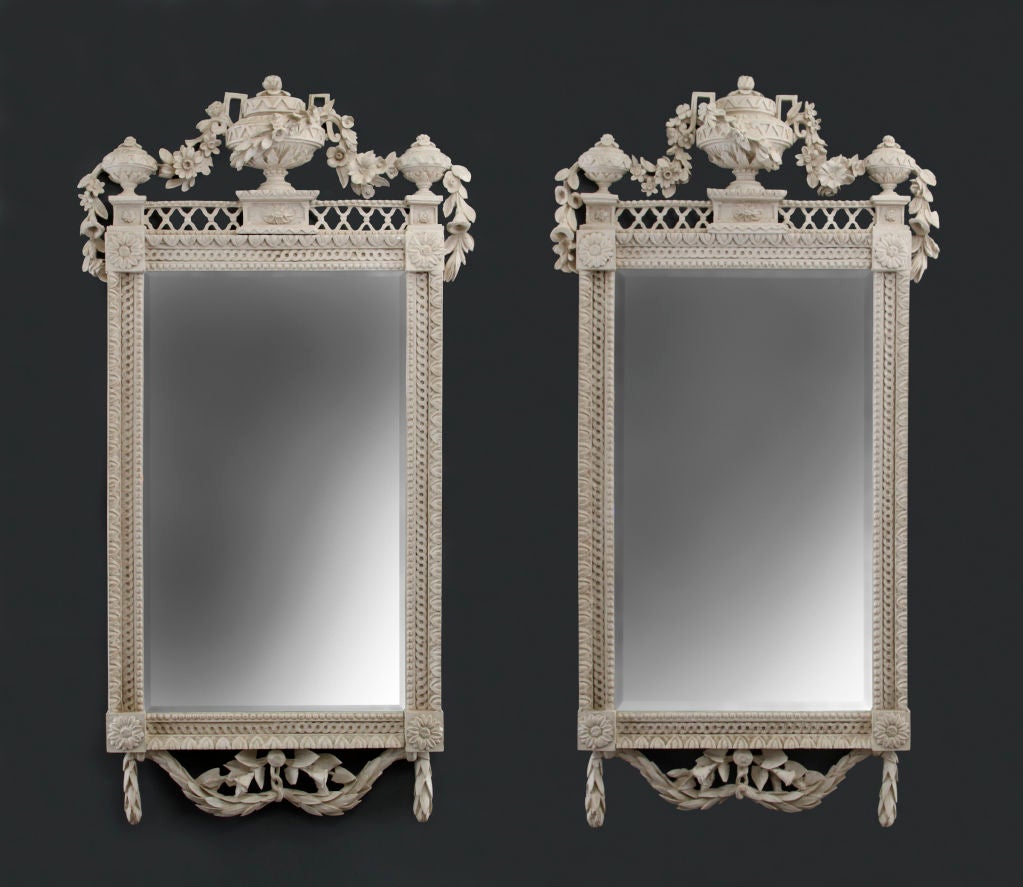 A Pair of North German Neoclassical Carved Wood Mirrors at 1stDibs