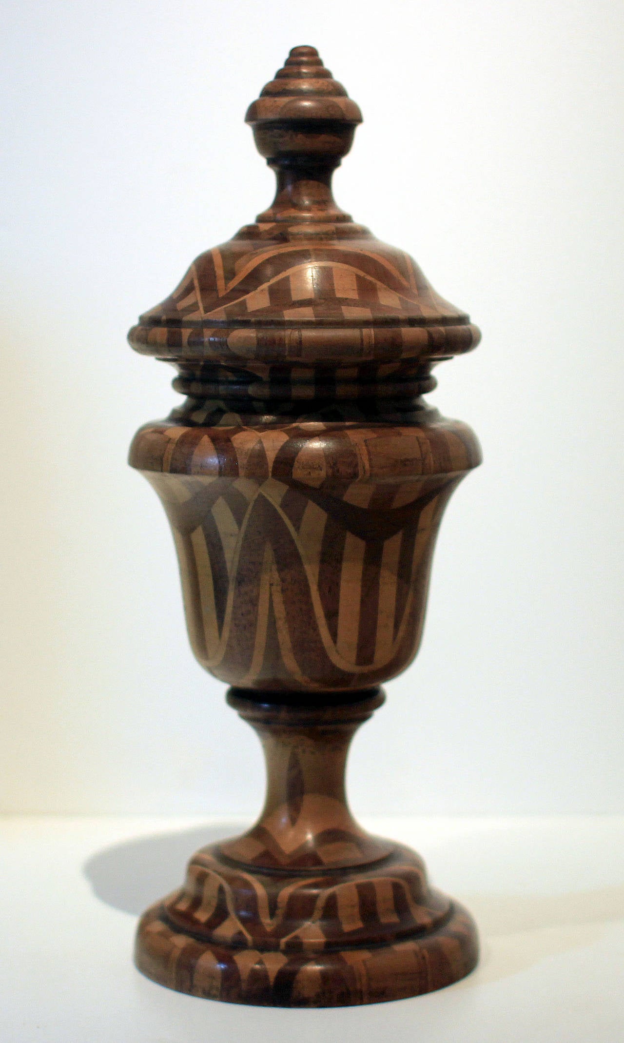 Mixed Wood Trophy Urn at 1stDibs
