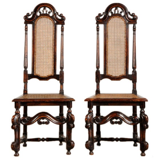 A pair of Charles II walnut side chairs from England c. 1875 at 1stDibs