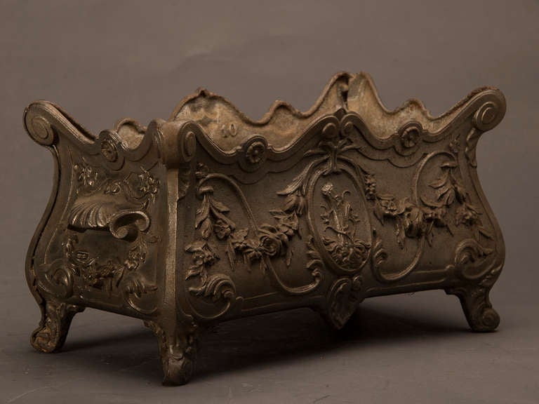 Baroque style cast iron jardiniere from Belle Epoque period, France c ...