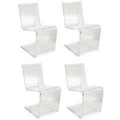 Set of Four Curvaceous Lucite Chairs at 1stDibs