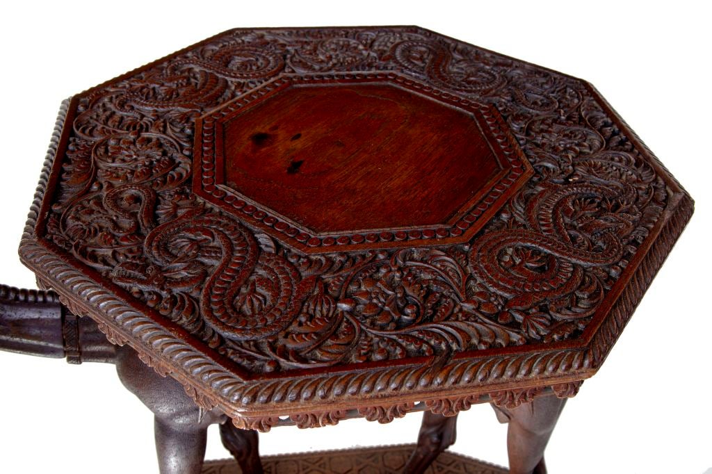 Antique Carved Octagonal Low Table Resting On A Camel at 1stDibs
