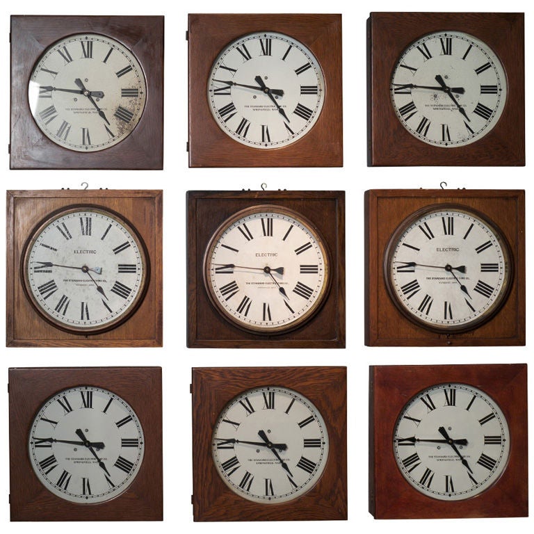 Collection of Nine Wood Case School Clocks at 1stDibs