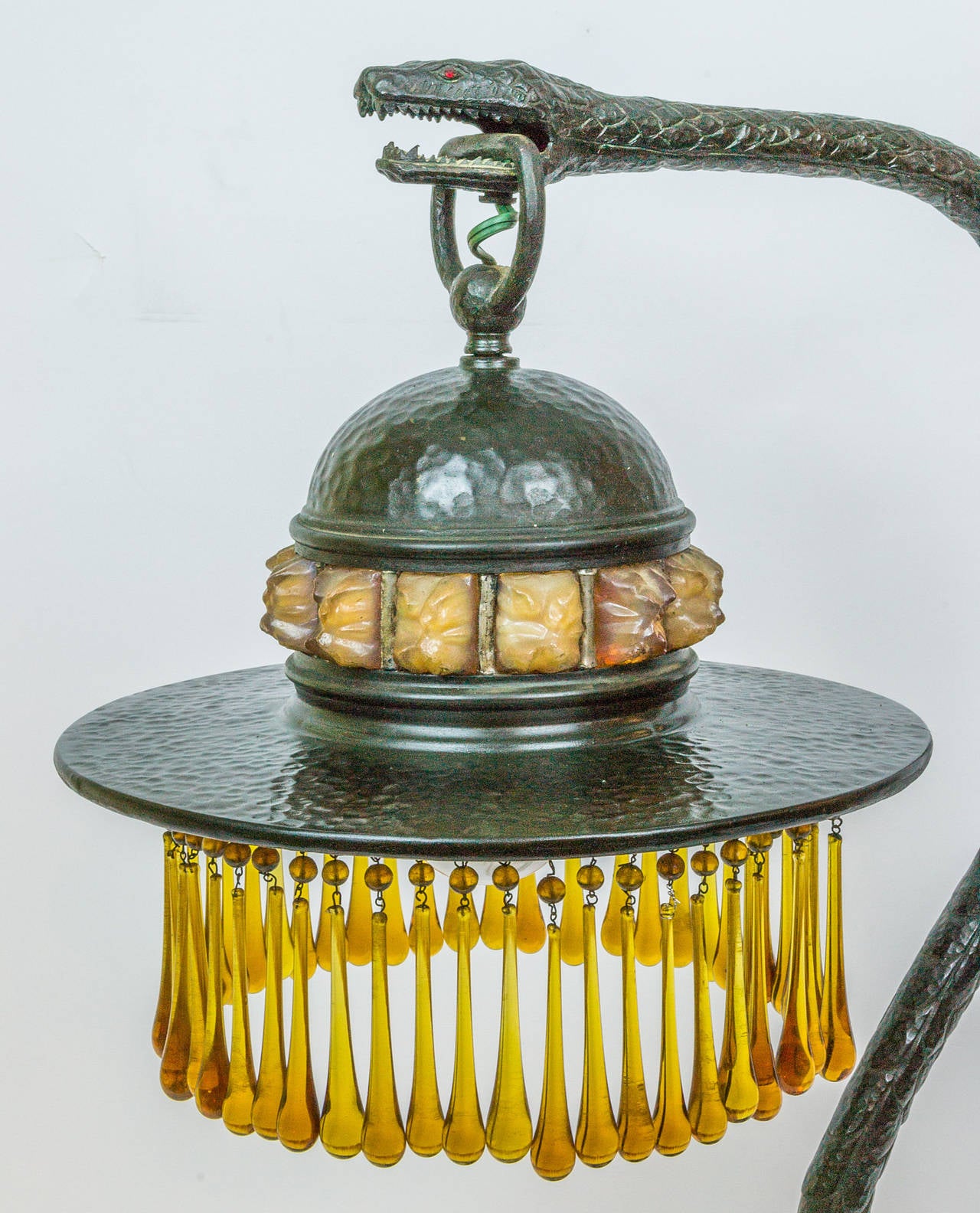 Tiffany Style Patinated Metal Lamp with Snake Form Base and Amber Glass ...