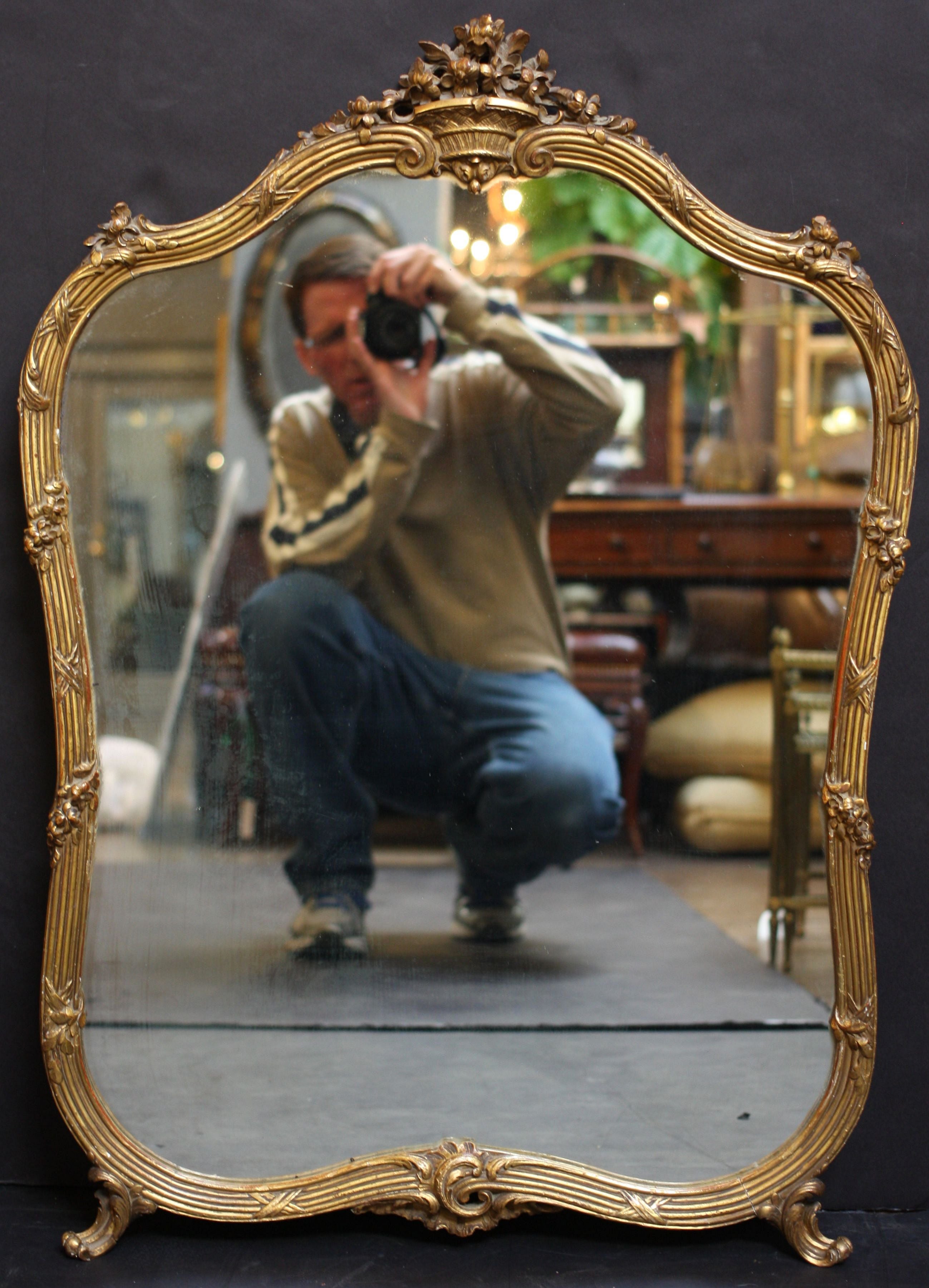 Gilt Mirror with Scroll and Ribbon Design at 1stDibs