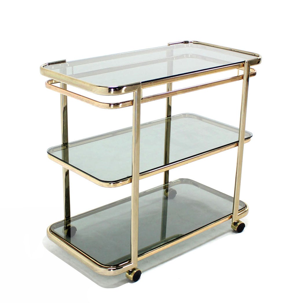 Three-Tier Brass Smoked Glass Cart Trolley at 1stDibs