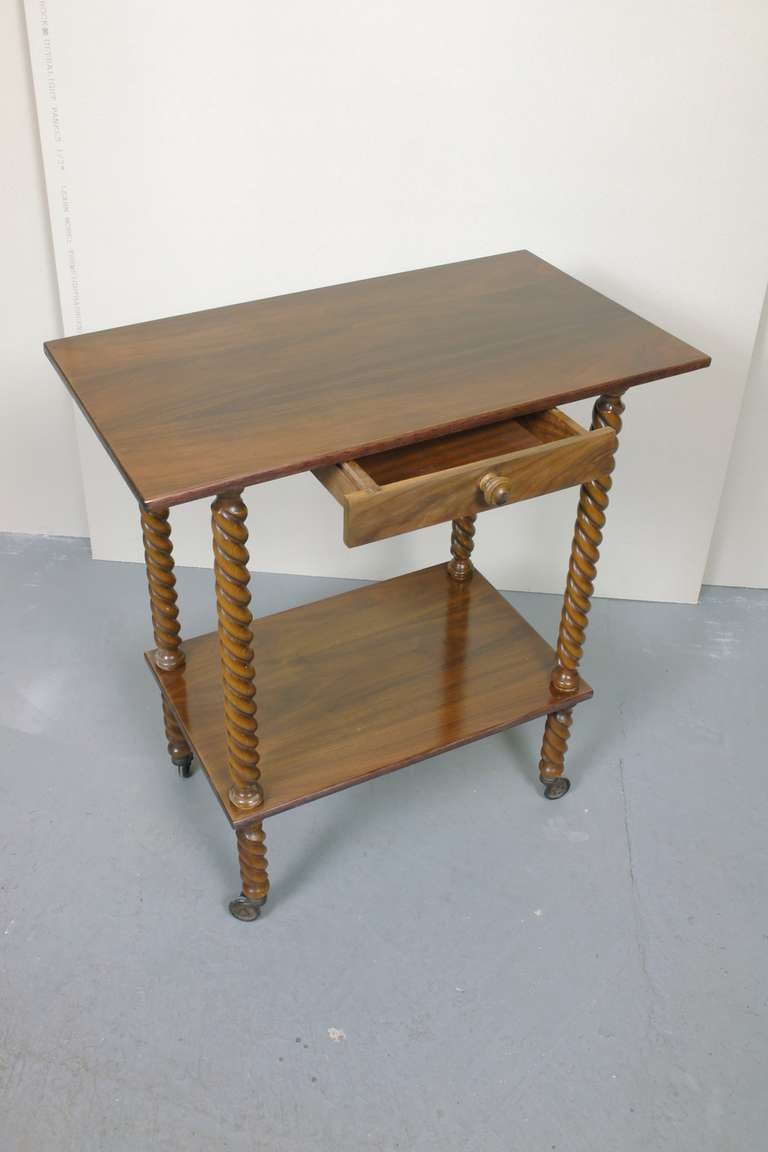 An Italian Side Table on Casters at 1stDibs