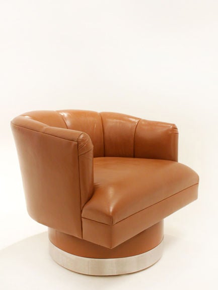 Pair of caramel leather chrome base swivel chairs at 1stDibs