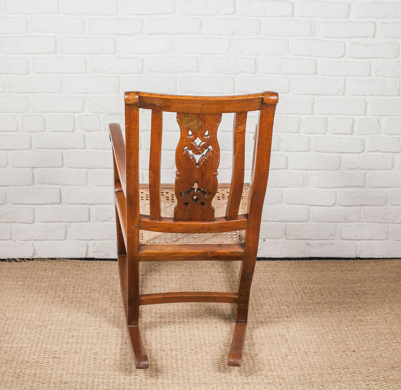Indo-Portuguese Teak Rocking Chair with Caned Seat For Sale at 1stDibs