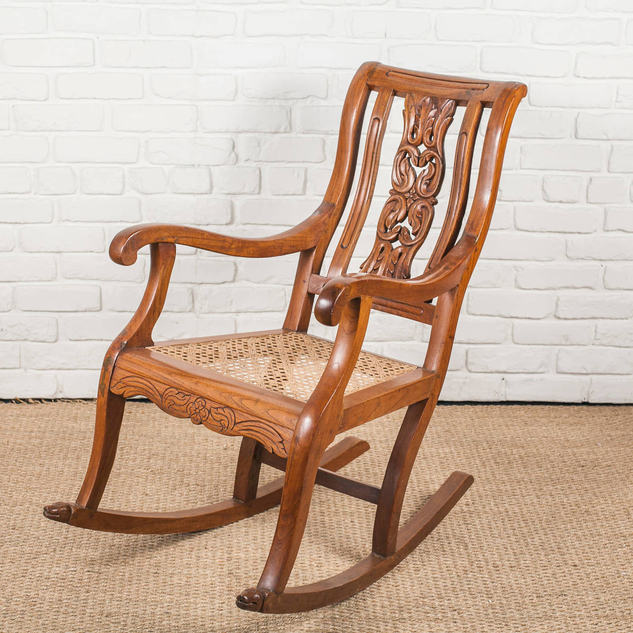 Indo-Portuguese Teak Rocking Chair with Caned Seat For Sale at 1stDibs