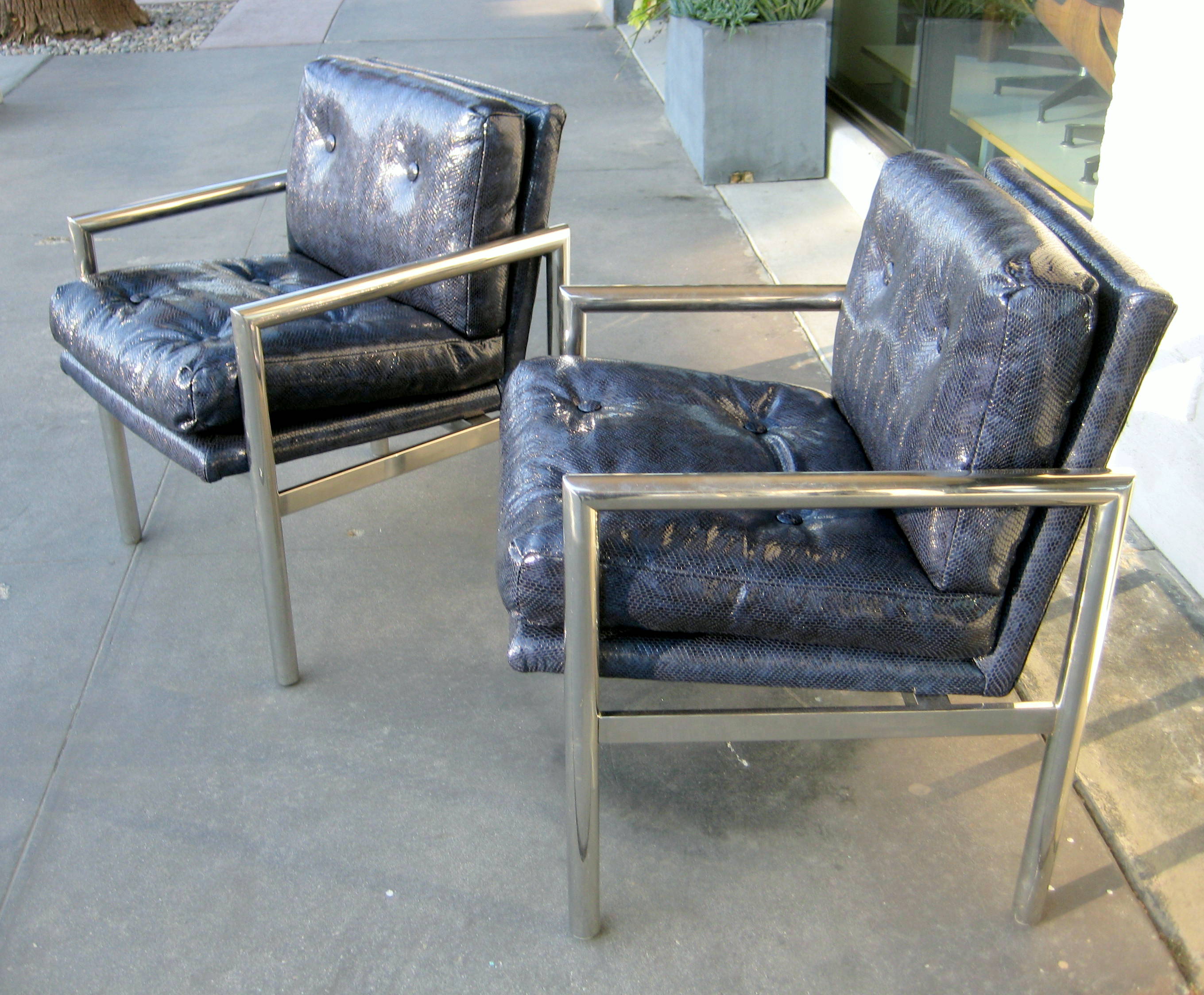 A pair of 1970's chrome and blue snake leather lounge chairs. at 1stDibs