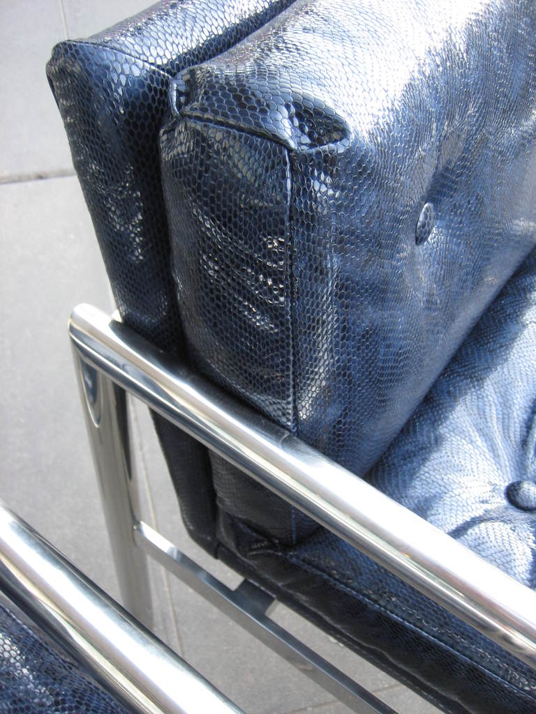 A pair of 1970's chrome and blue snake leather lounge chairs. at 1stDibs