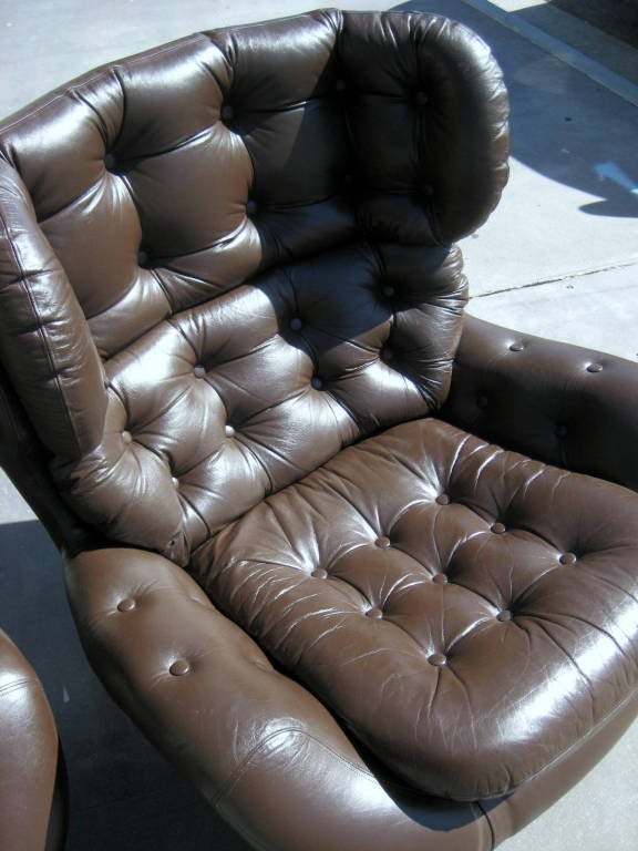 A pair of leather pod chairs manufactured by Swedfurn c. 1960's at ...
