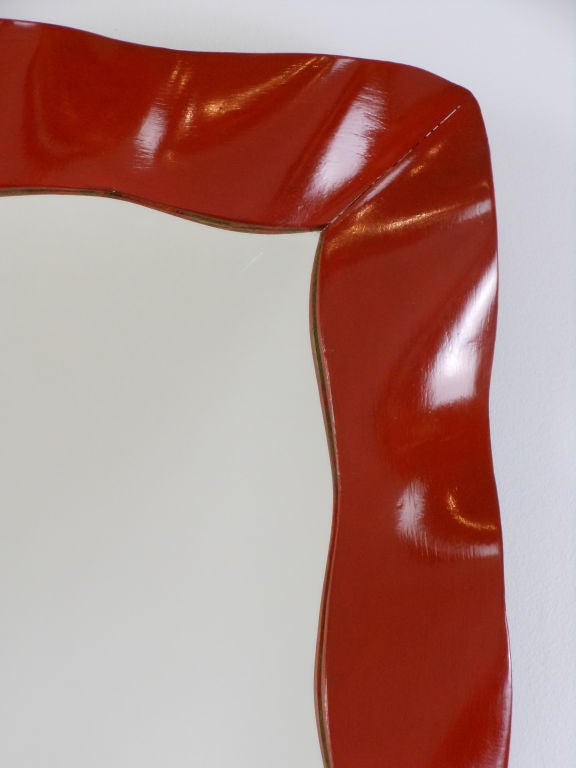 A French Red Lacquer Wave Molded Mirror at 1stDibs