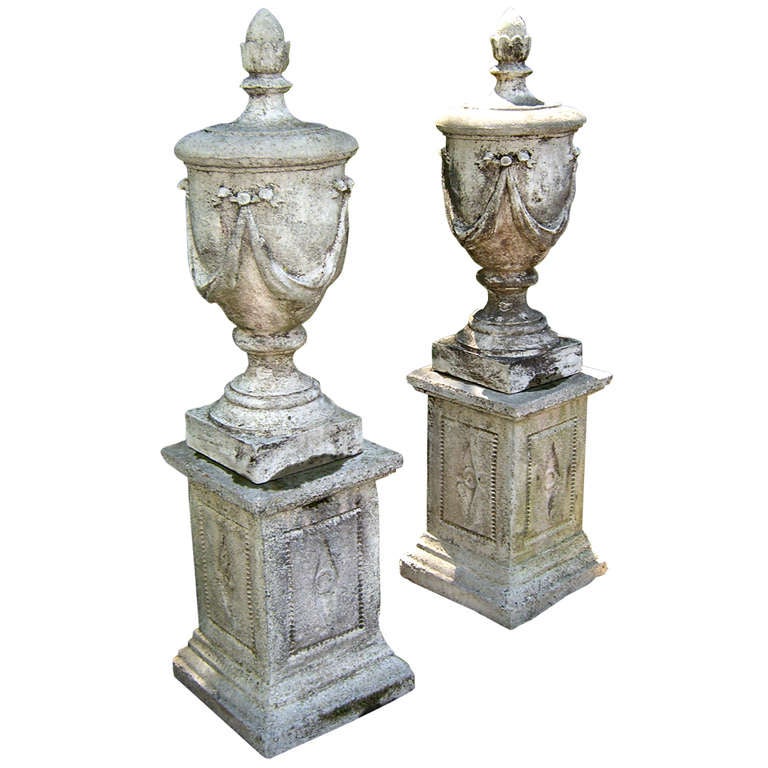 A Stunning Pair of Stone Vase Finials on Plinths at 1stDibs