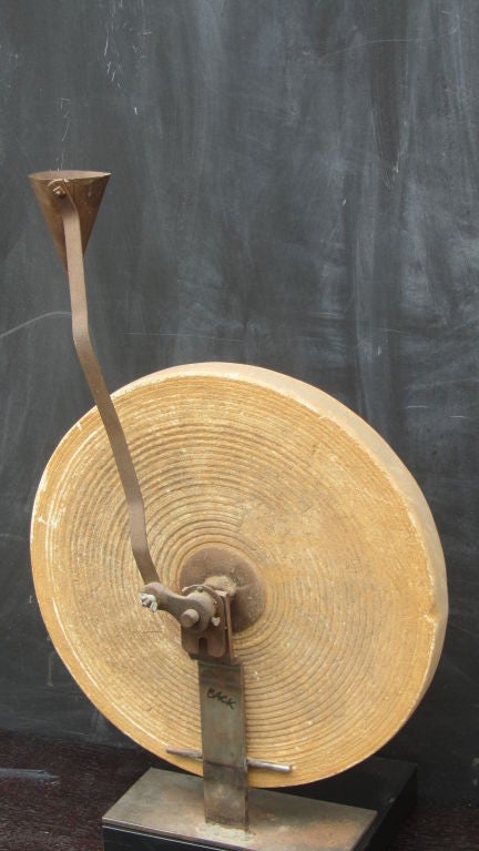 Iconic Farm Grinding Wheel On Base at 1stDibs