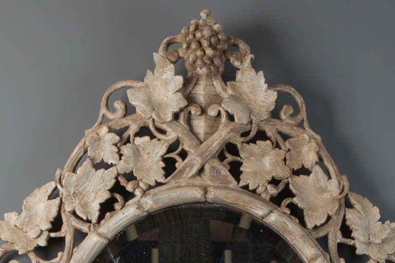 Large Beveled Oval Mirror with Carved Grape Vines For Sale at 1stDibs