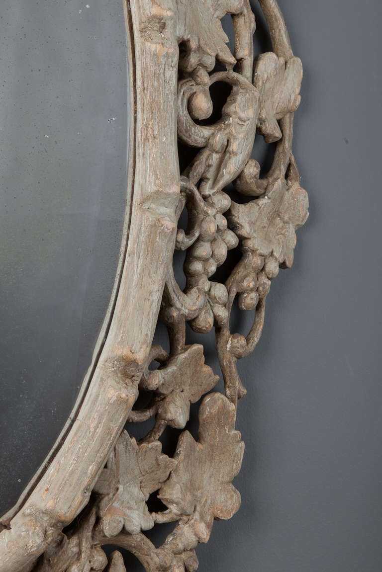 Large Beveled Oval Mirror with Carved Grape Vines For Sale at 1stDibs