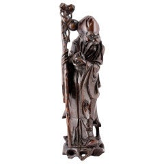 Carved Chinese Wood Figure With Silver Inlaid. at 1stDibs